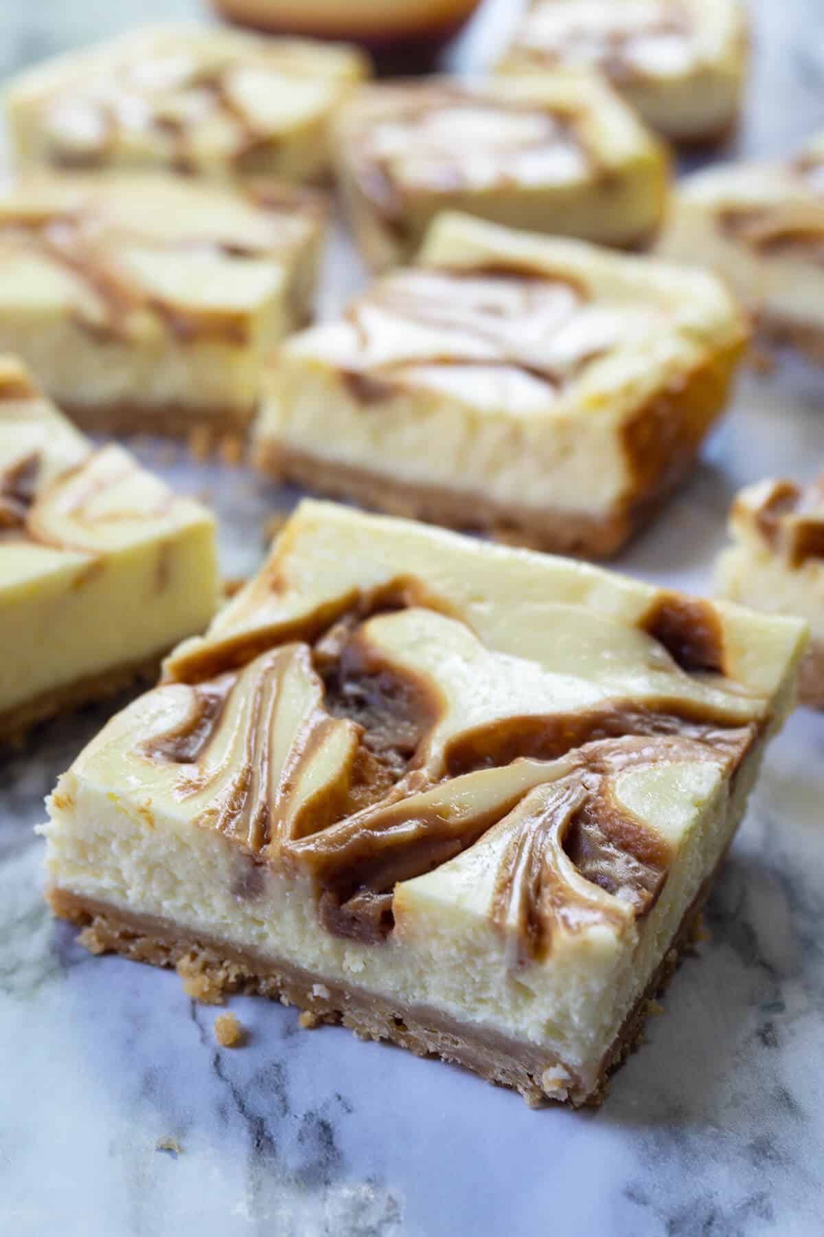 Swirled Caramel Cheesecake Bars | Foodtasia