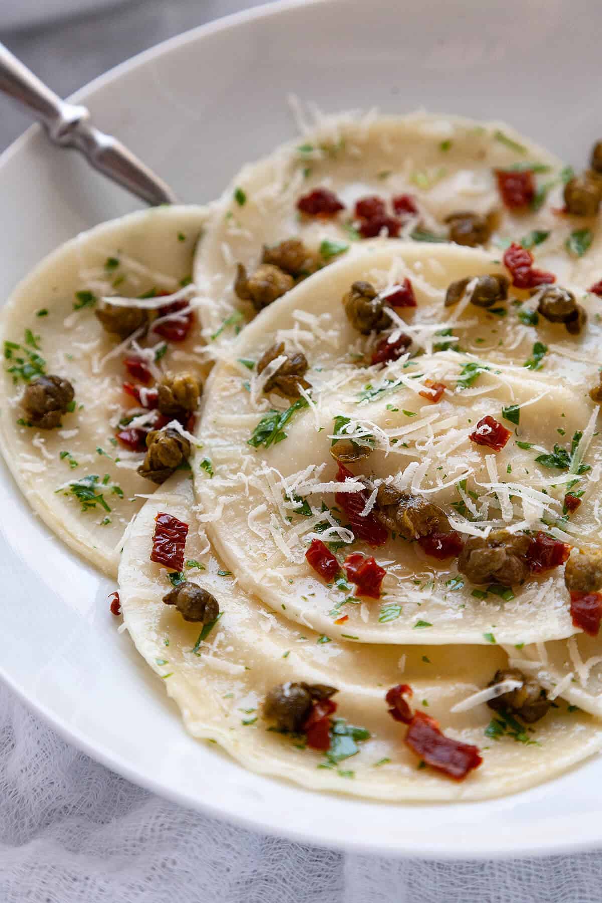 Easy Artichoke Ravioli with Sun Dried Tomatoes and Fried Capers | Foodtasia